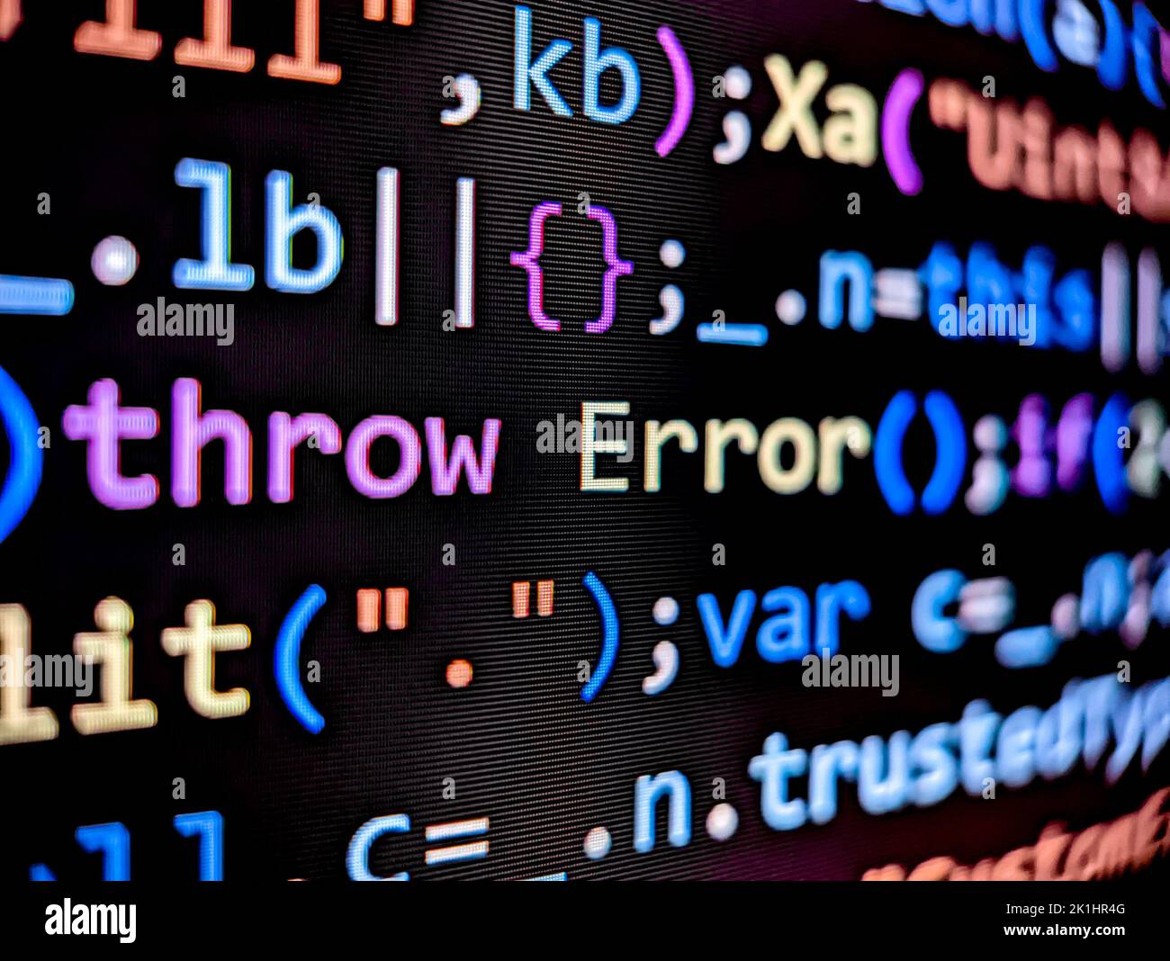 Computer code with error displayed on pixelated screen with colorful ...