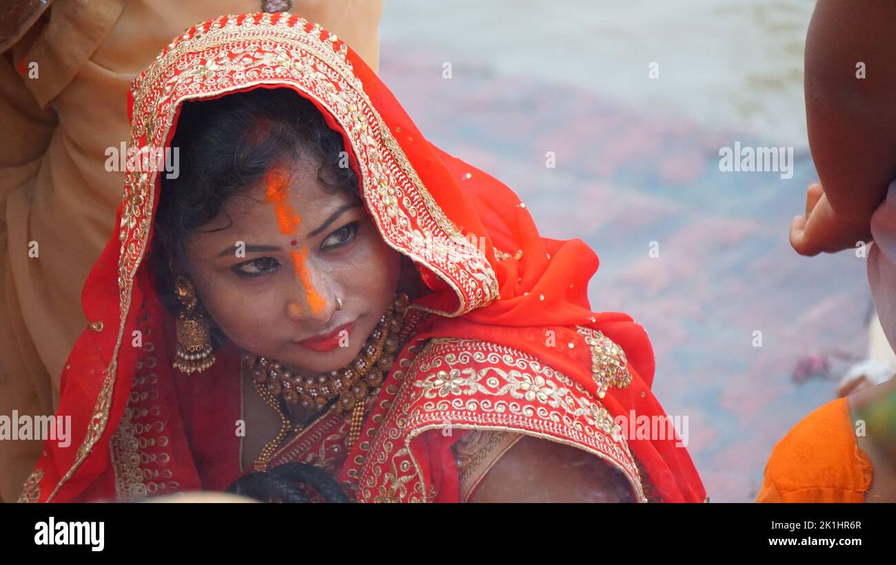 Kolkata, India. 18th Sep, 2022. Women taking a bath at the holy river ...