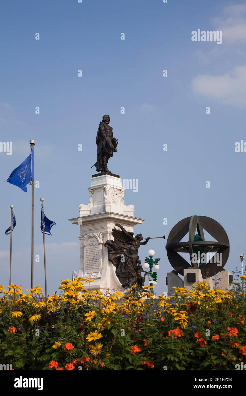 Samuel de Champlain monument through border of colourful flowers on ...