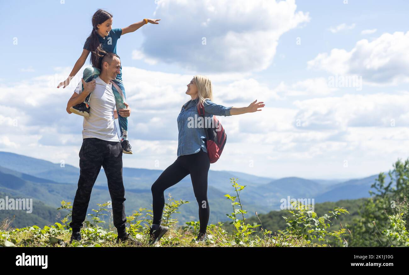 Happy family: mother, father, child daughter on nature Stock Photo - Alamy
