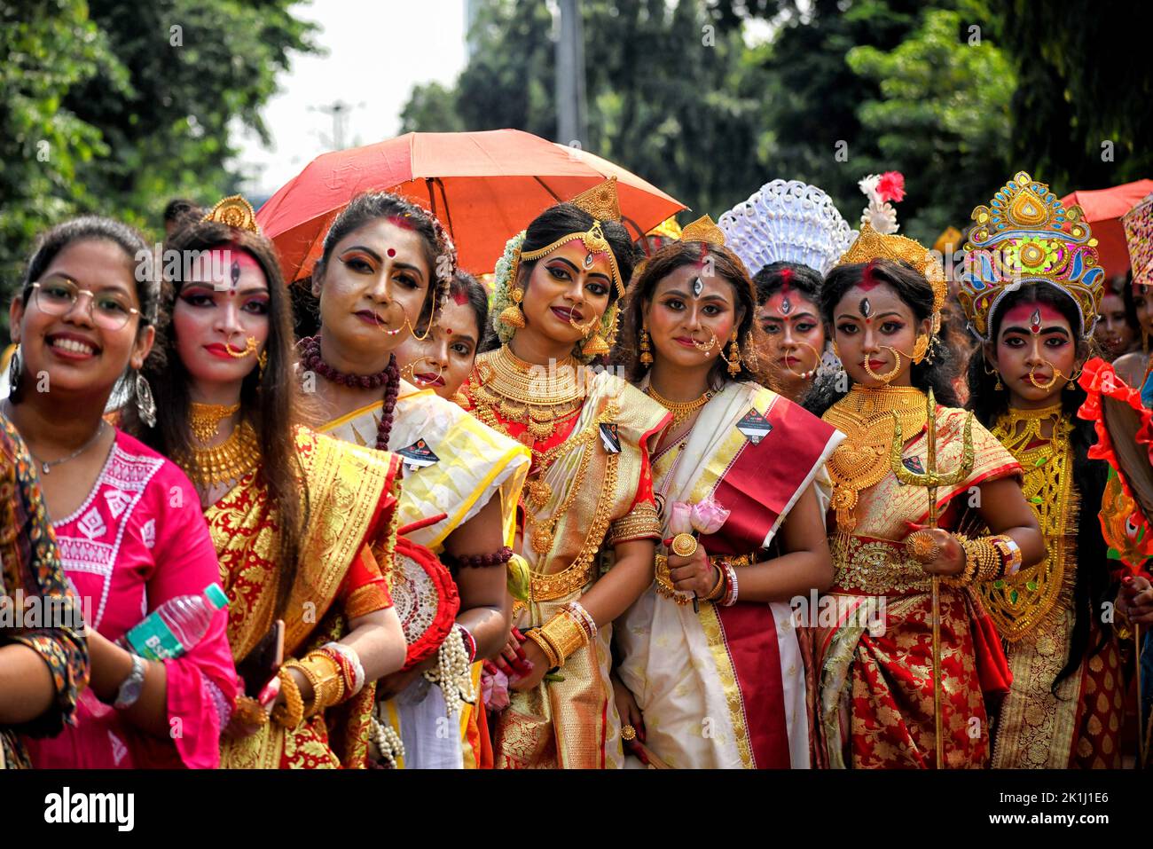 Models dressed as Hindu deity Durga take part in a live makeup event ...