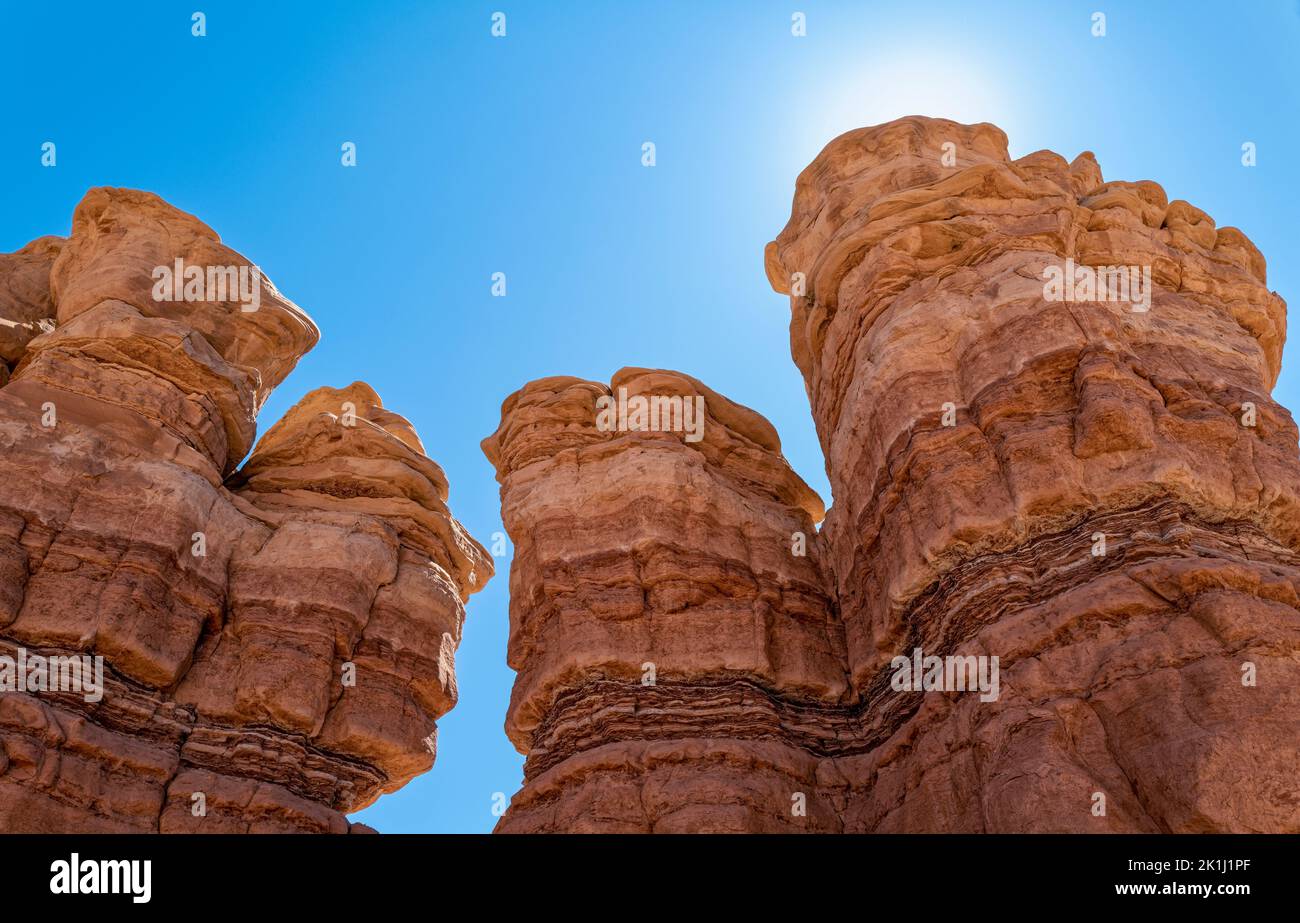 The peaks of backlit rock formations along Notom Road Scenic Backway ...