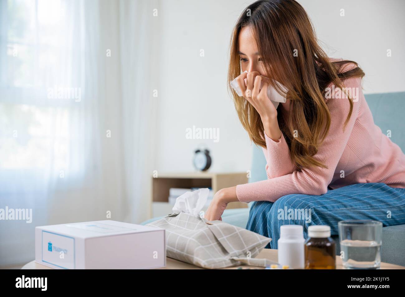 Sick woman. Beautiful female health problem blowing nose use pharmacy ...