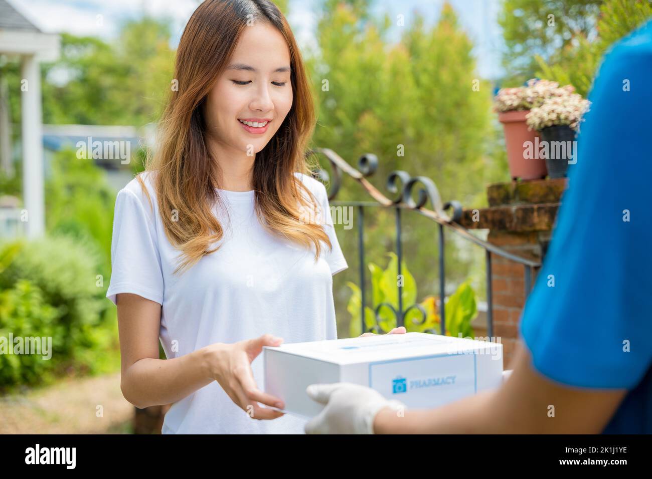 Asian woman sick she receive medication first aid pharmacy box hospital ...