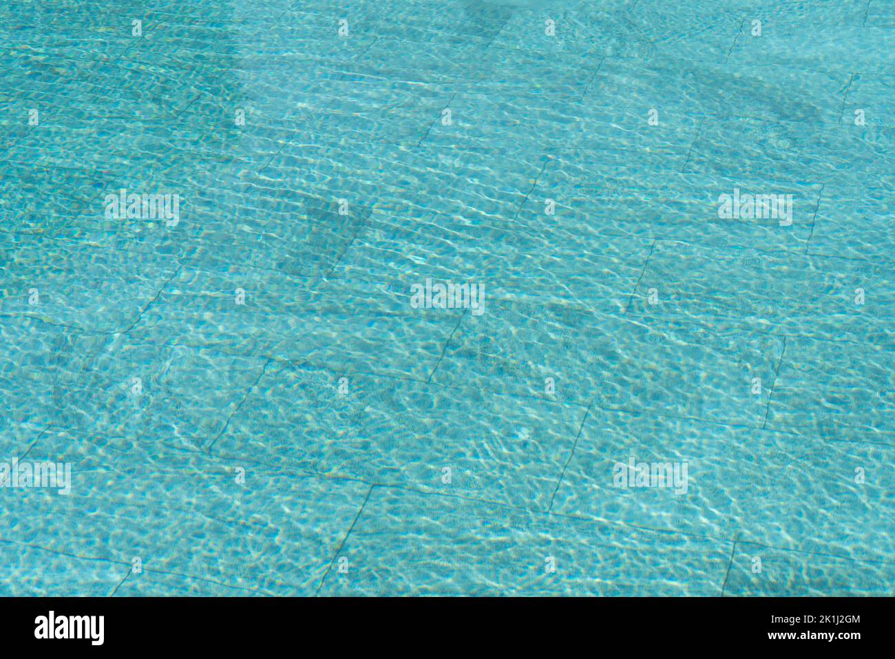 Swimming pool water background with caustic ripple. Aquatic surface ...