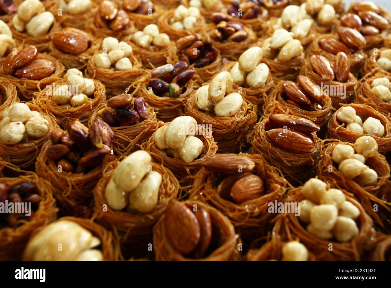 Traditional Turkish dessert 'Pistachio and hazelnut wrap kadayif' on ...