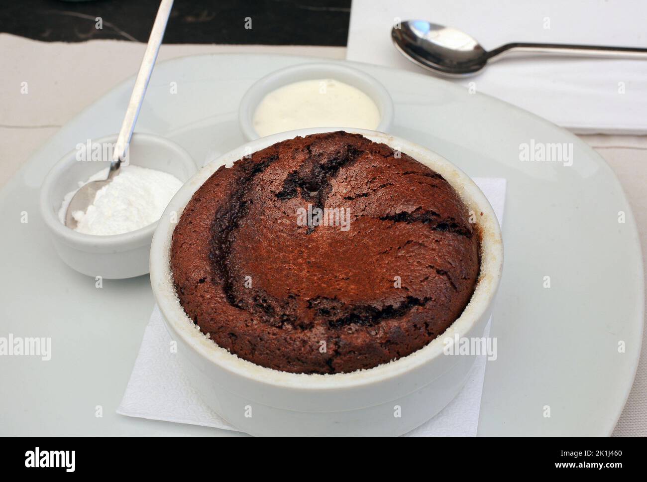 Chocolate souffle on the dessert plate Stock Photo - Alamy