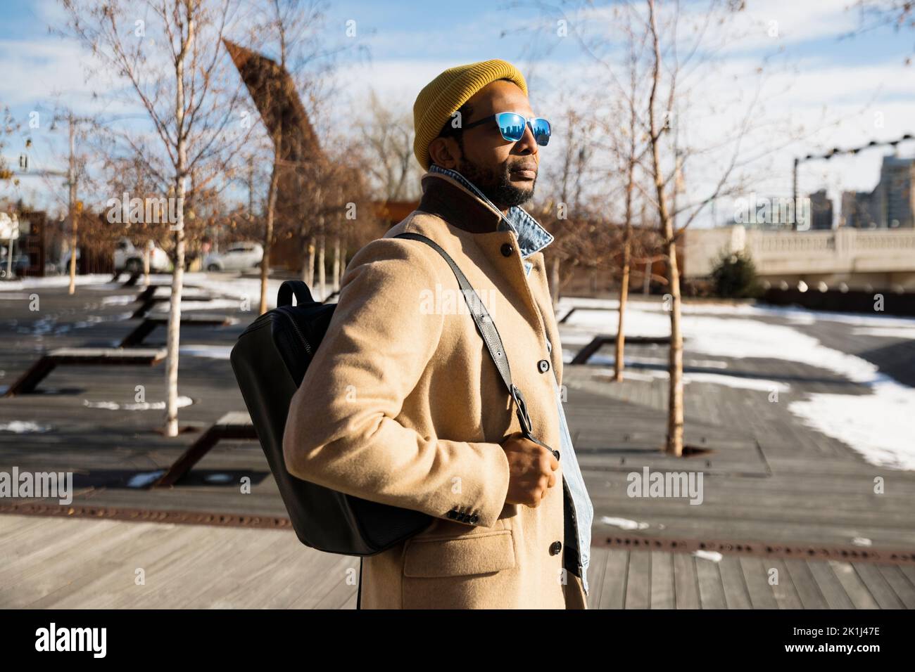 Man backpack african hi-res stock photography and images - Alamy