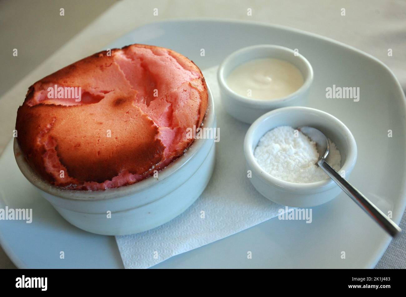 Strawberry souffle on the dessert plate Stock Photo - Alamy