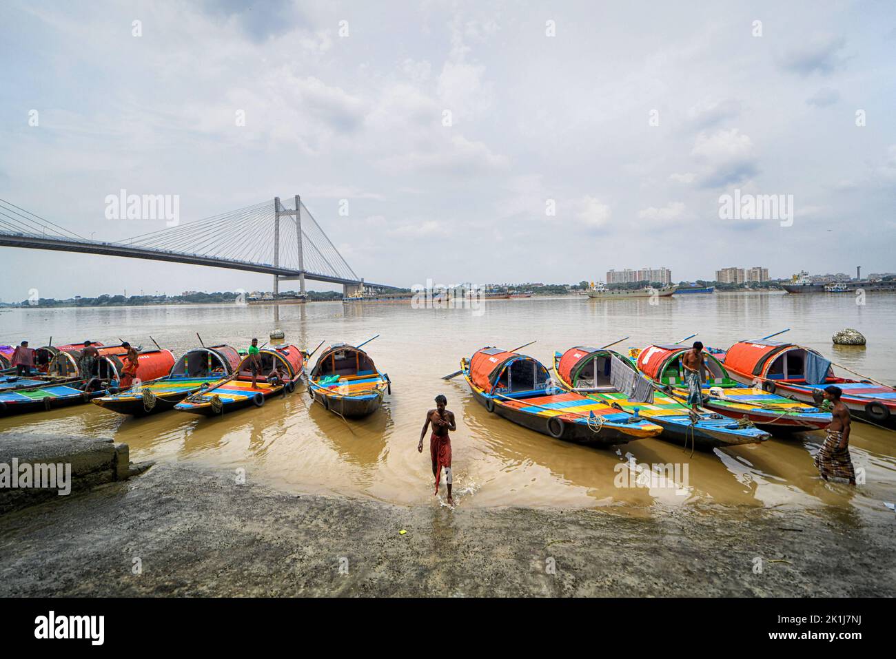 Kolkata, India. 18th Sep, 2022. A man takes a bath on River Ganges ...
