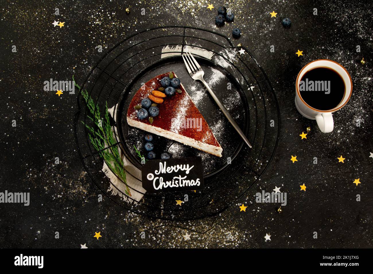 Christmas cake slice on dark background. Traditional dessert of festive ...