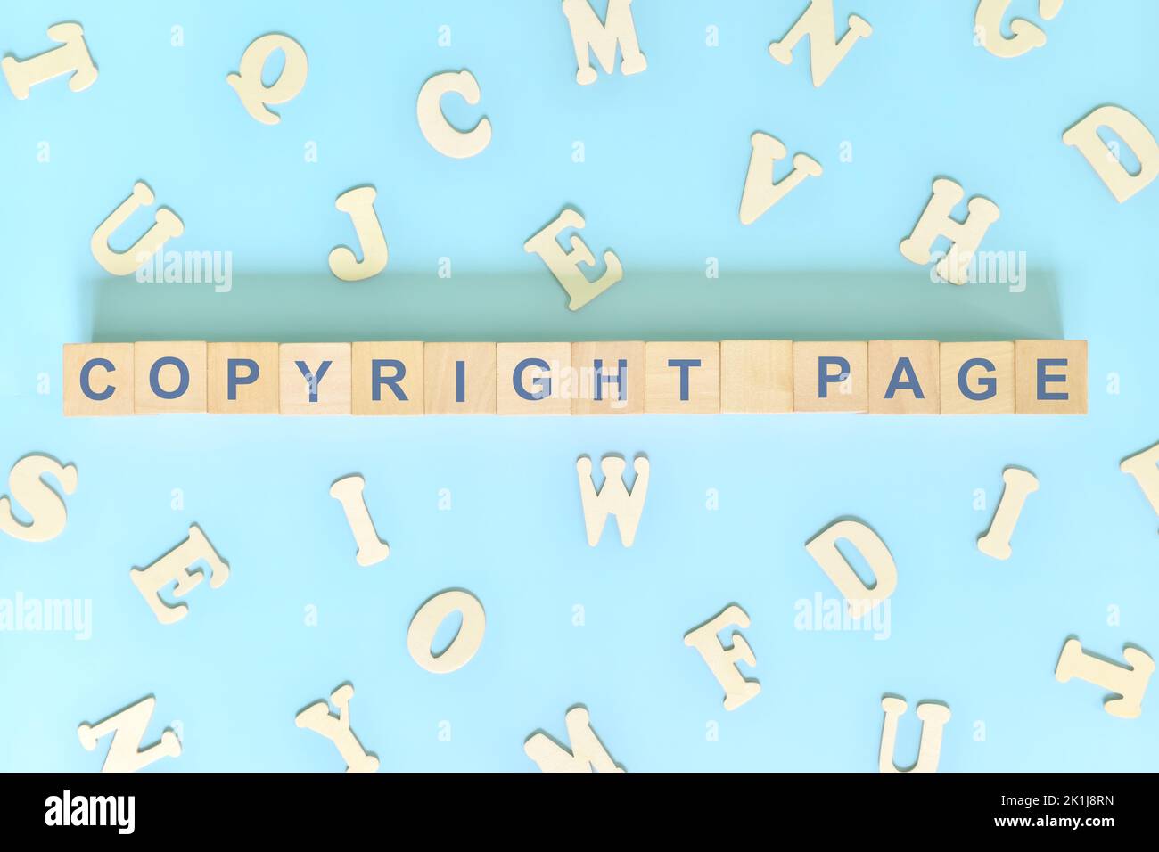 Copyright page part of a book concept. Wooden blocks typography word ...