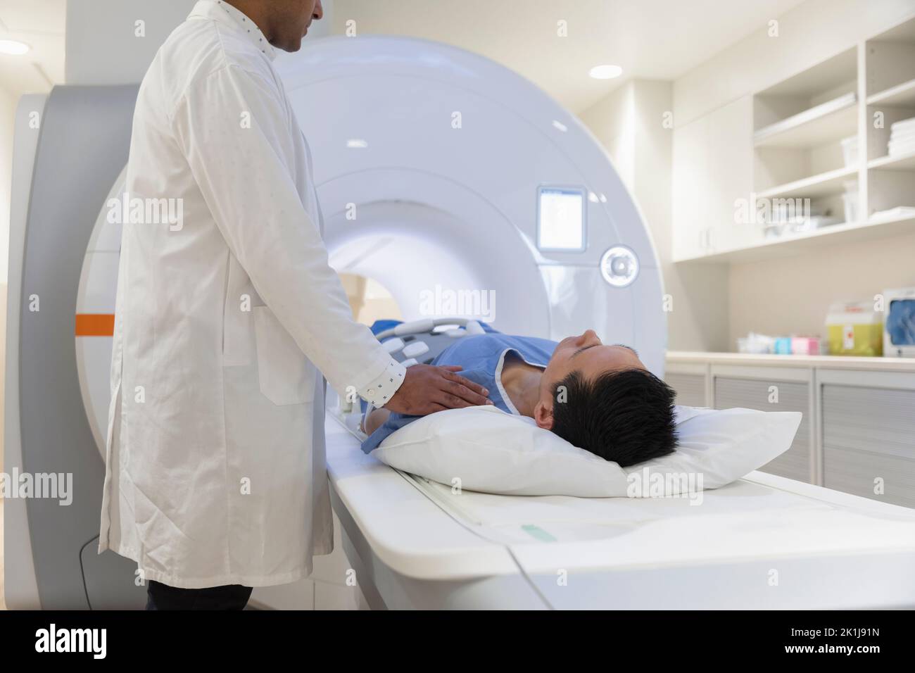Mri scanning patient asian hi-res stock photography and images - Alamy