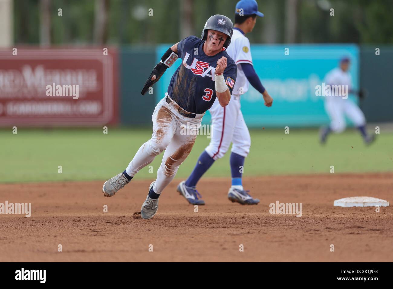 Sarasota, FL. USA; Team USA left fielder Max Clark (3) runs to third on ...