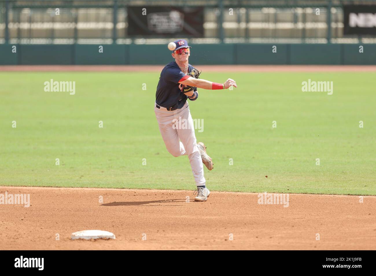 Sarasota, FL. USA; Team USA shortstop Dylan Cupp (6) fields a ball hit ...