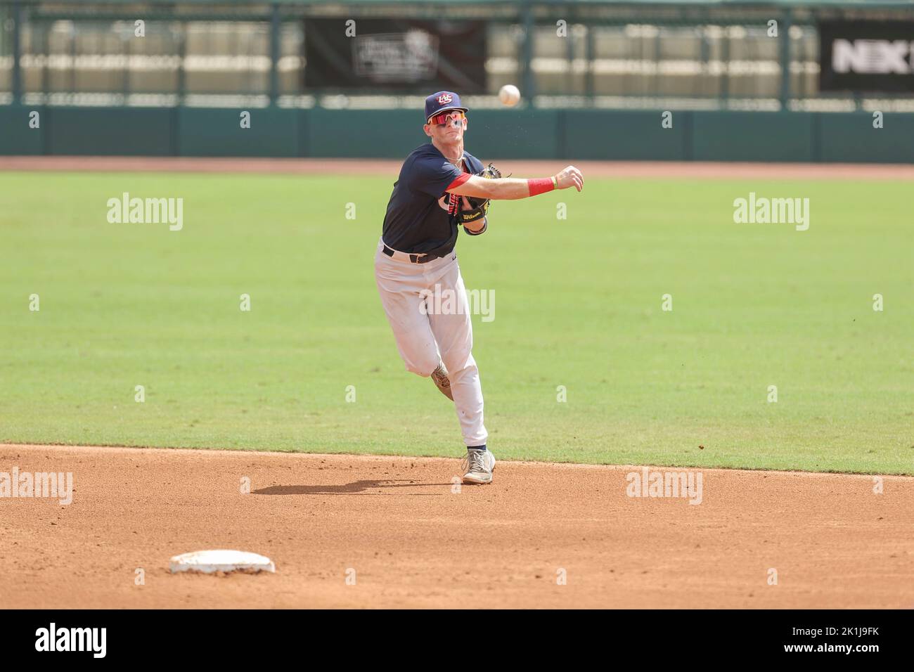 Sarasota, FL. USA; Team USA shortstop Dylan Cupp (6) fields a ball hit ...