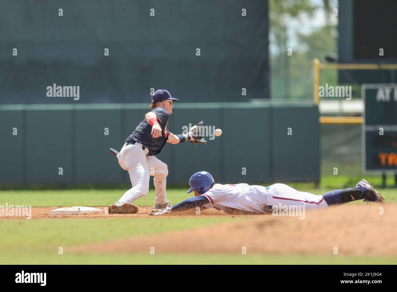 Sarasota, FL. USA; Team USA shortstop Dylan Cupp (6) gets the ball late ...