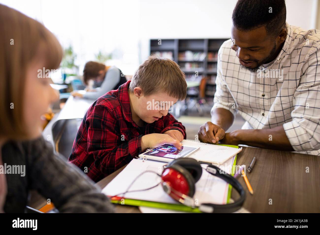 Helping down syndrome student hi-res stock photography and images - Alamy Helping down syndrome student hi-res stock photography and images - Alamy