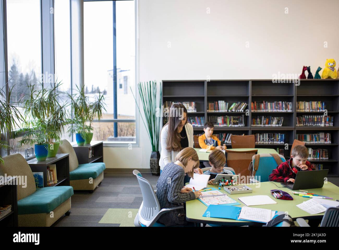 Middle school teacher high five hi-res stock photography and images - Alamy