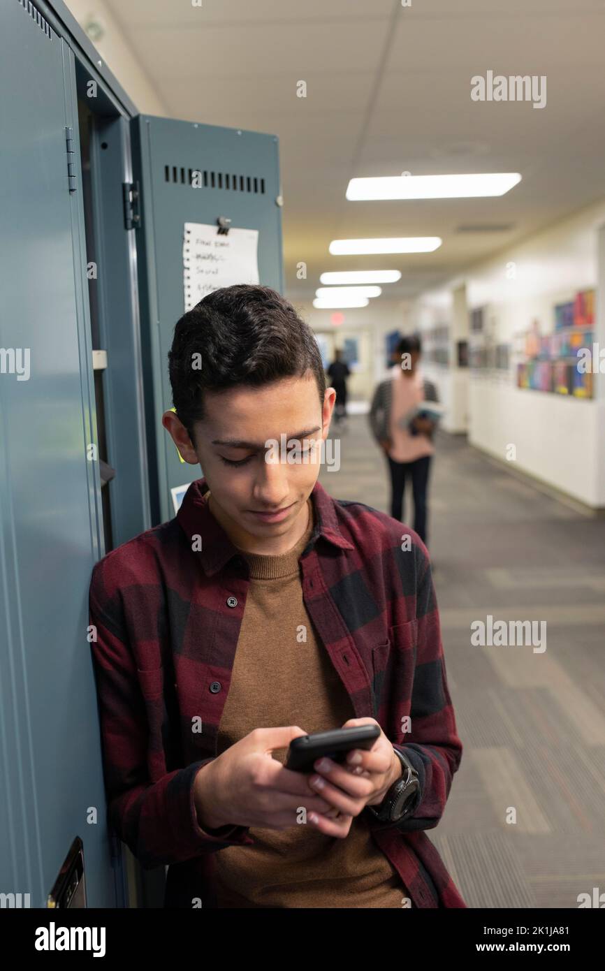 Junior high boy student using smart phone hi-res stock photography and ...