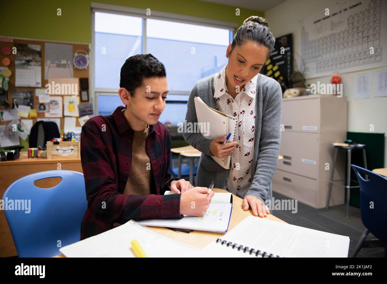 Student standing front class reading hi-res stock photography and ...
