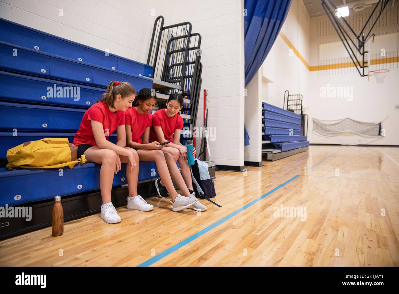 Girls text phone school uniform hi-res stock photography and images - Alamy