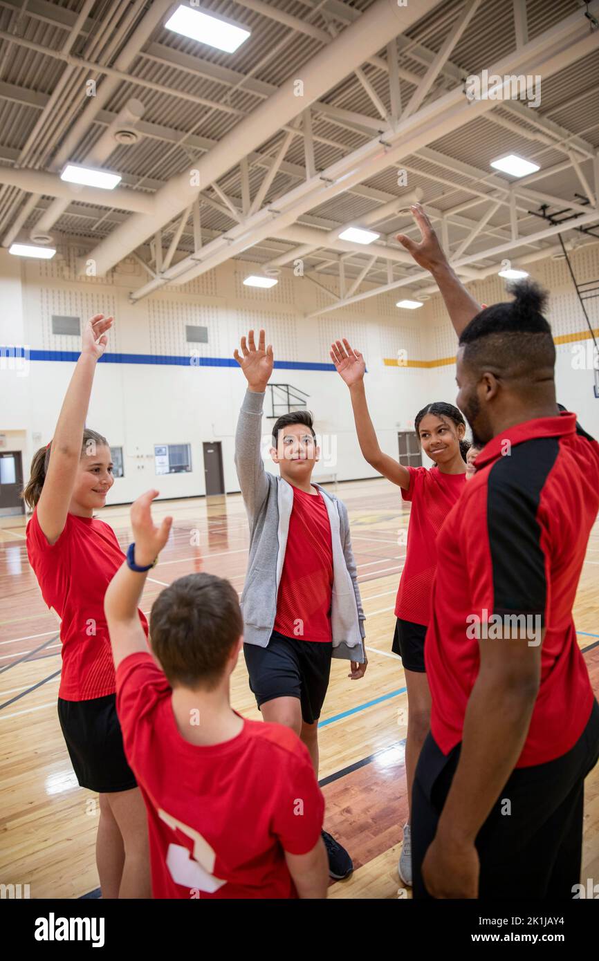 Boys basketball gym coach hi-res stock photography and images - Alamy