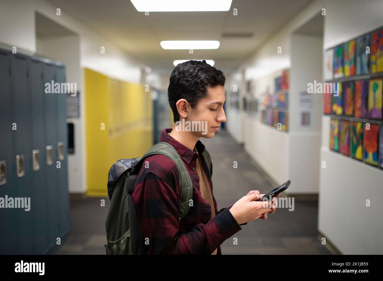 Junior high boy student using smart phone hi-res stock photography and ...