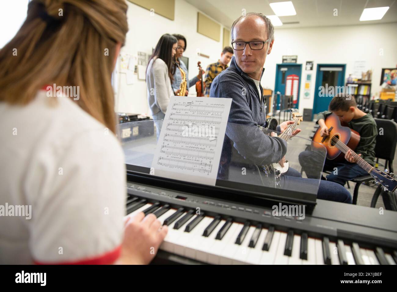 Piano teacher hi-res stock photography and images - Alamy