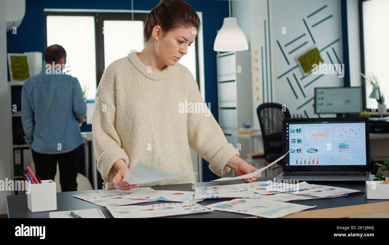 Portrait employee analyzing charts papers hi-res stock photography and ...