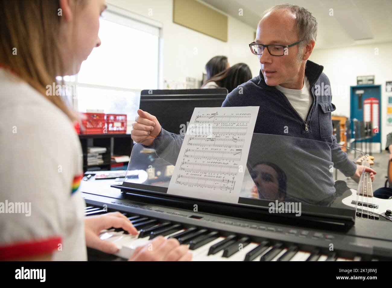 Student learning piano hi-res stock photography and images - Alamy
