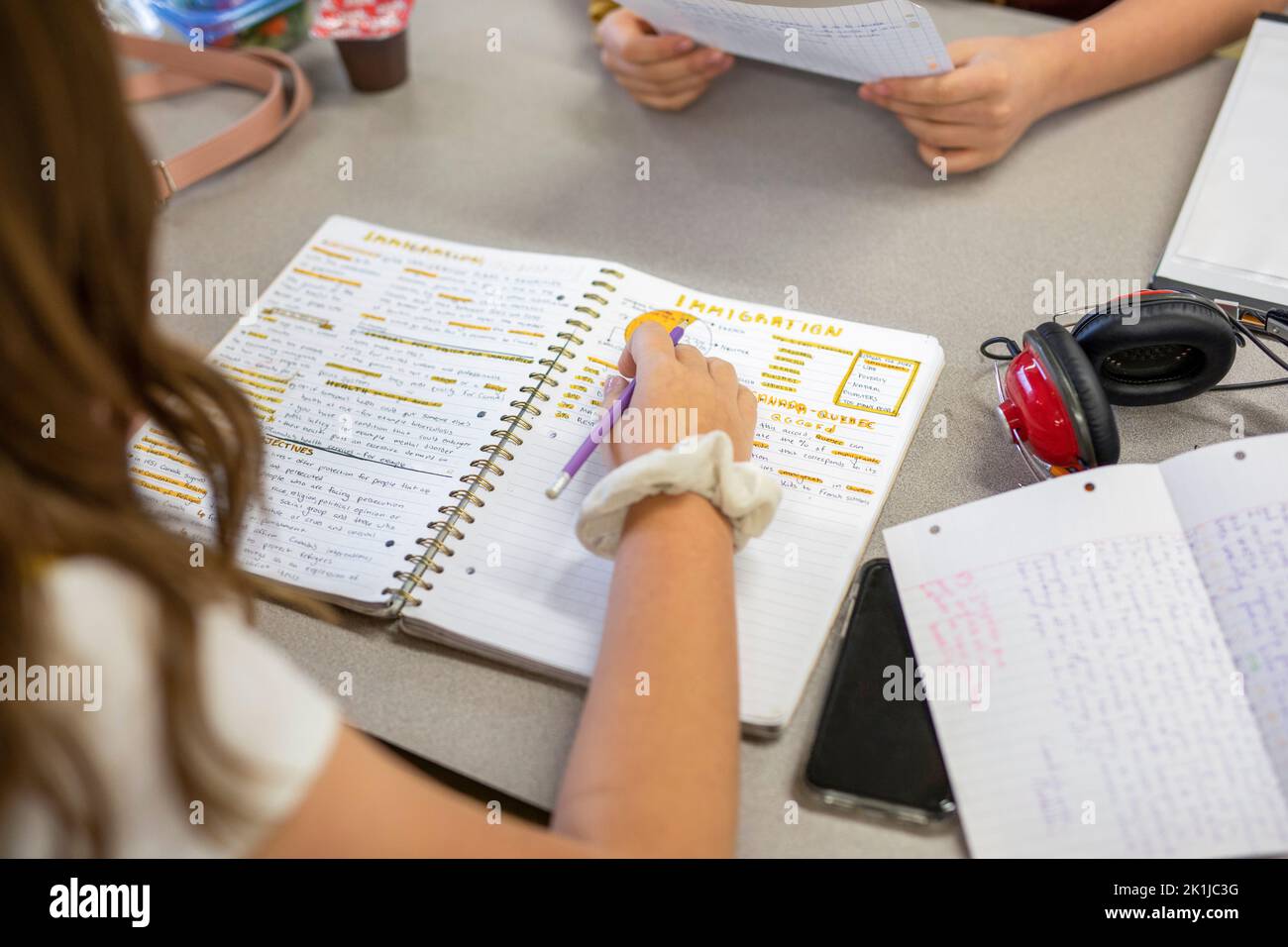 Girl student notebook table hi-res stock photography and images - Alamy