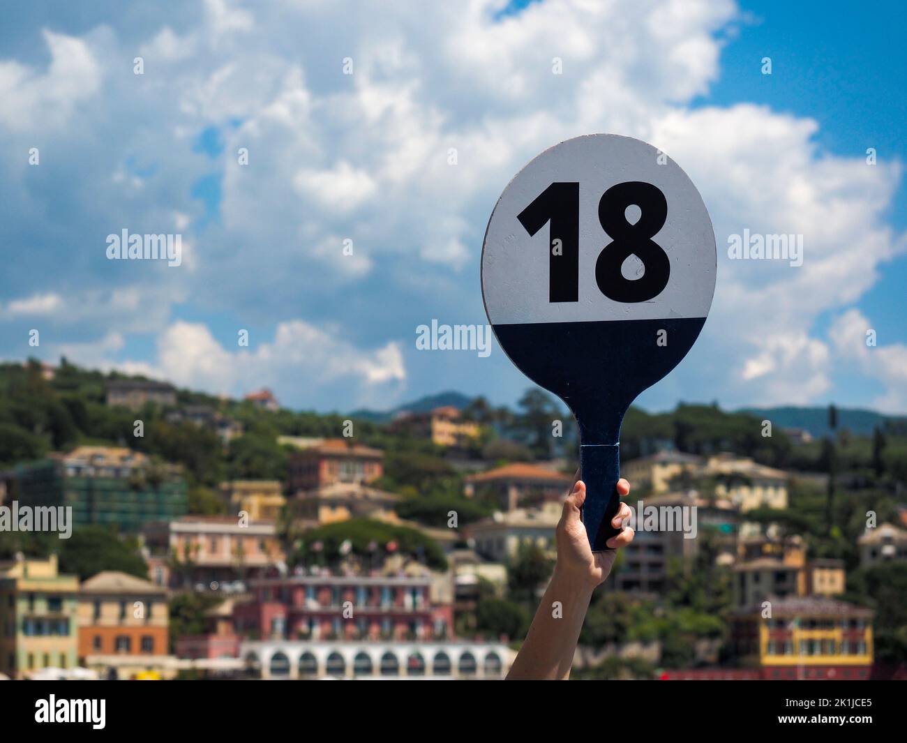 SANTA MARGHERITA LIGURE, ITALY - MAY 19, 2018:Tour Guide hand holding ...