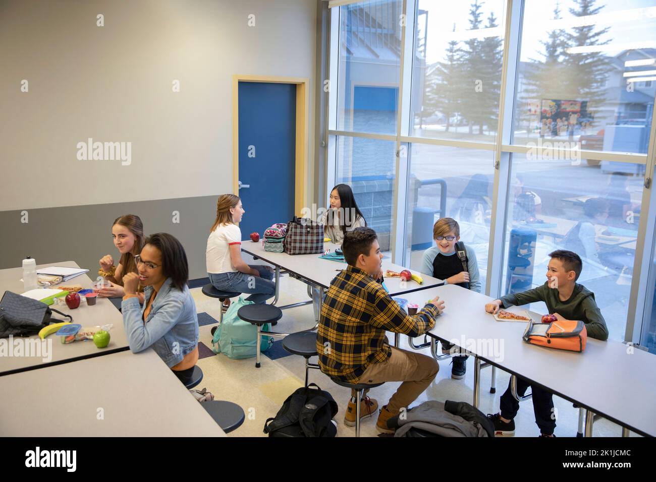 Junior high students in cafeteria Stock Photo - Alamy