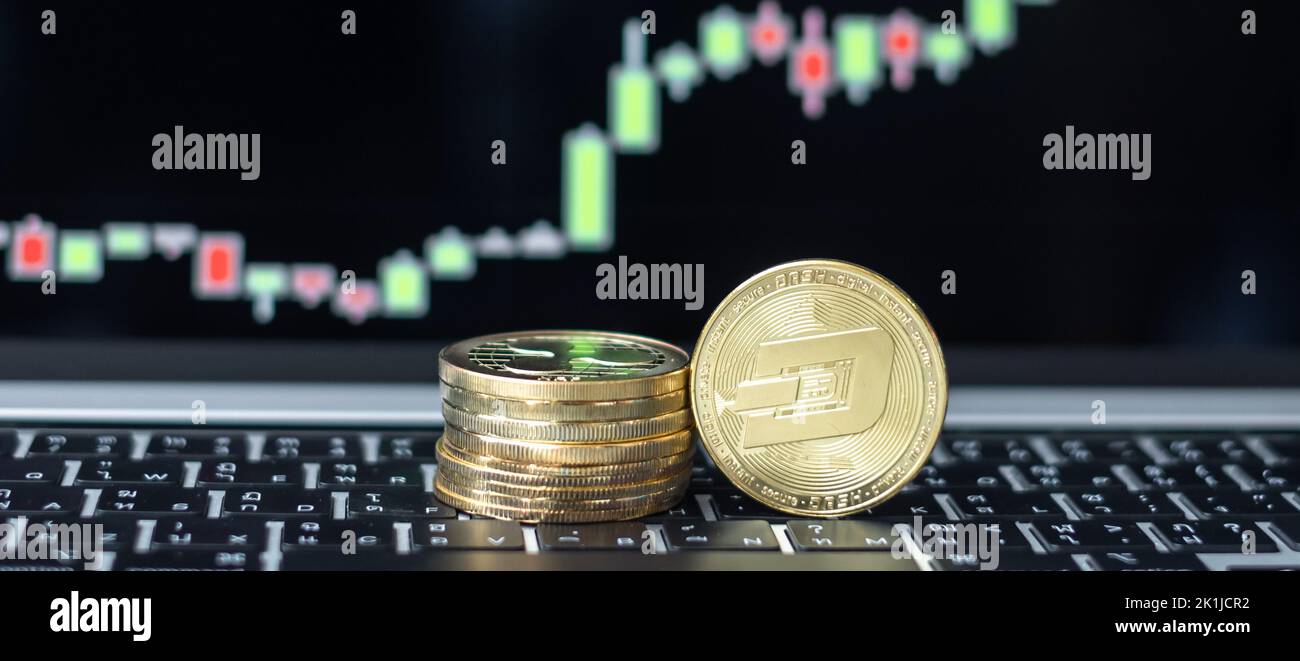 Golden Dash cryptocurrency coin with candle graph background, Crypto is ...
