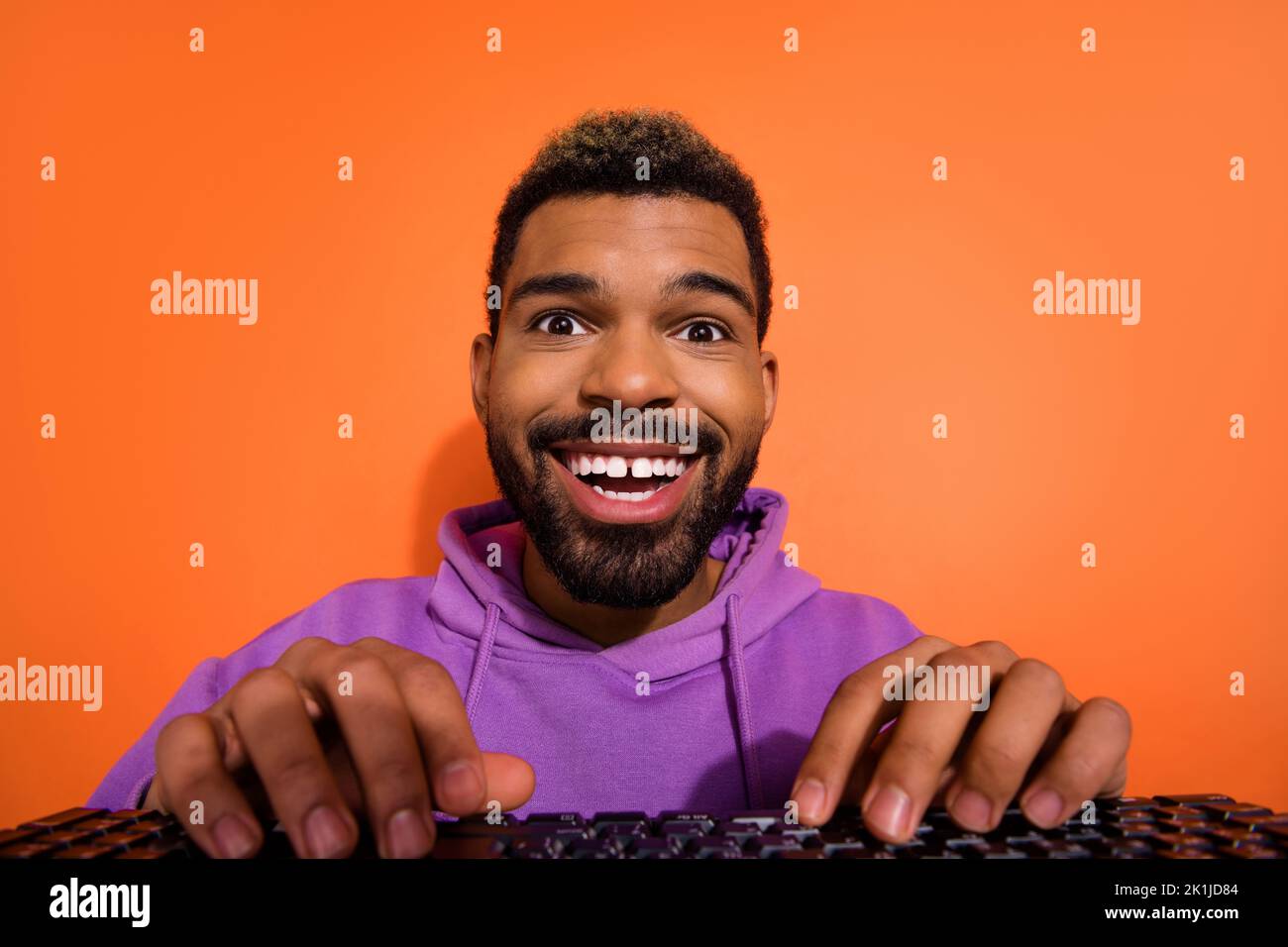 Photo of excited positive person hands typing keyboard toothy smile ...