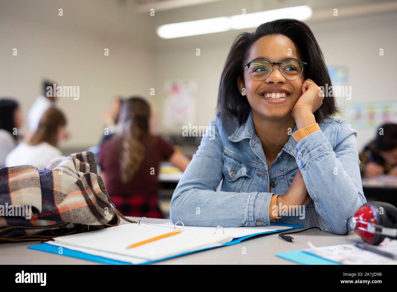 African school girl posing at a desk hi-res stock photography and ...