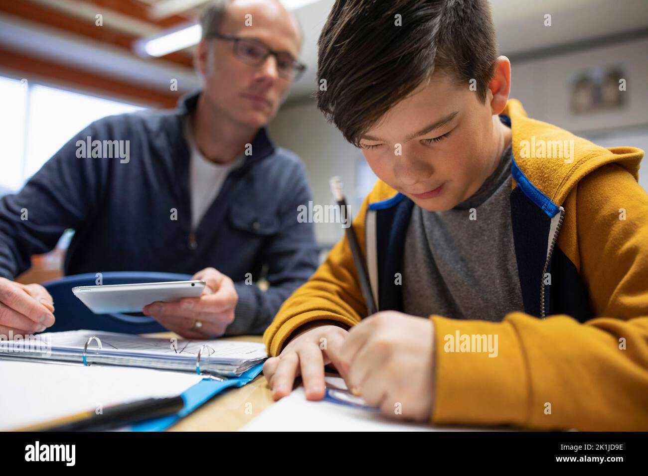 Helping junior hi-res stock photography and images - Alamy