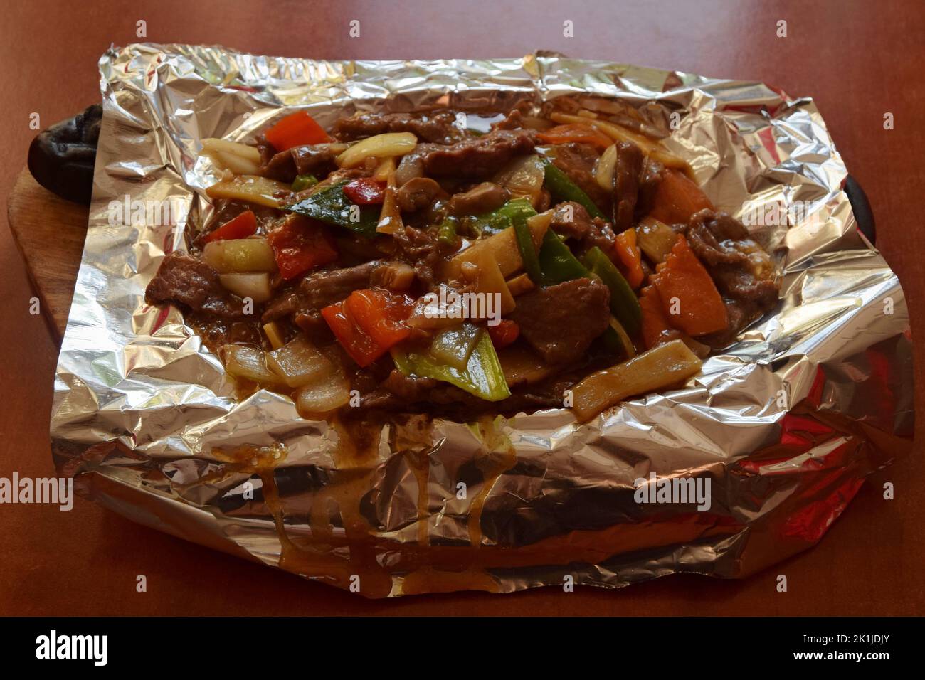 Hot plate sizzling beef with various vegetable, one of the Chinese ...