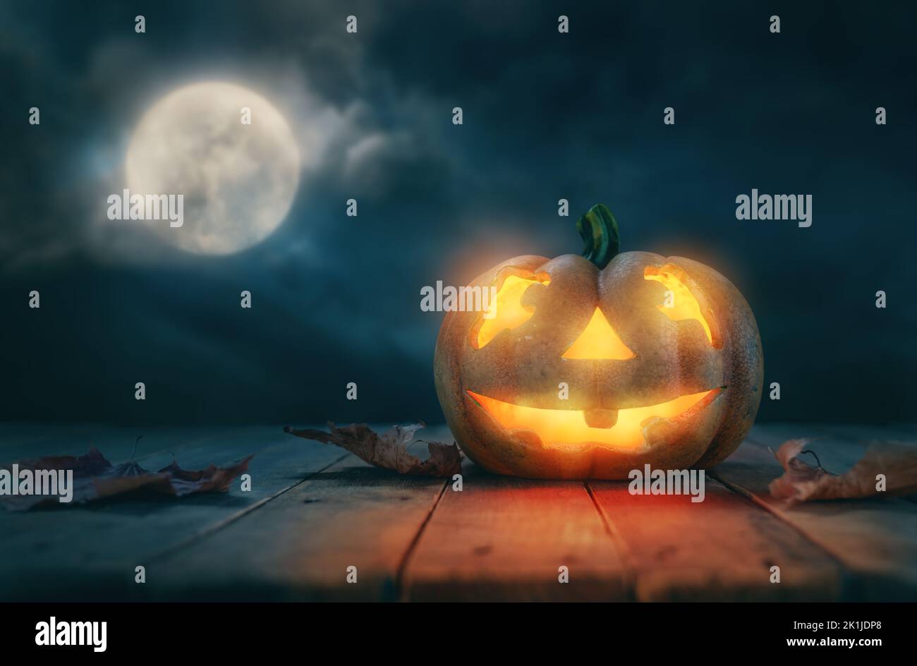 Halloween pumpkin on wood on the background of the night sky with the ...