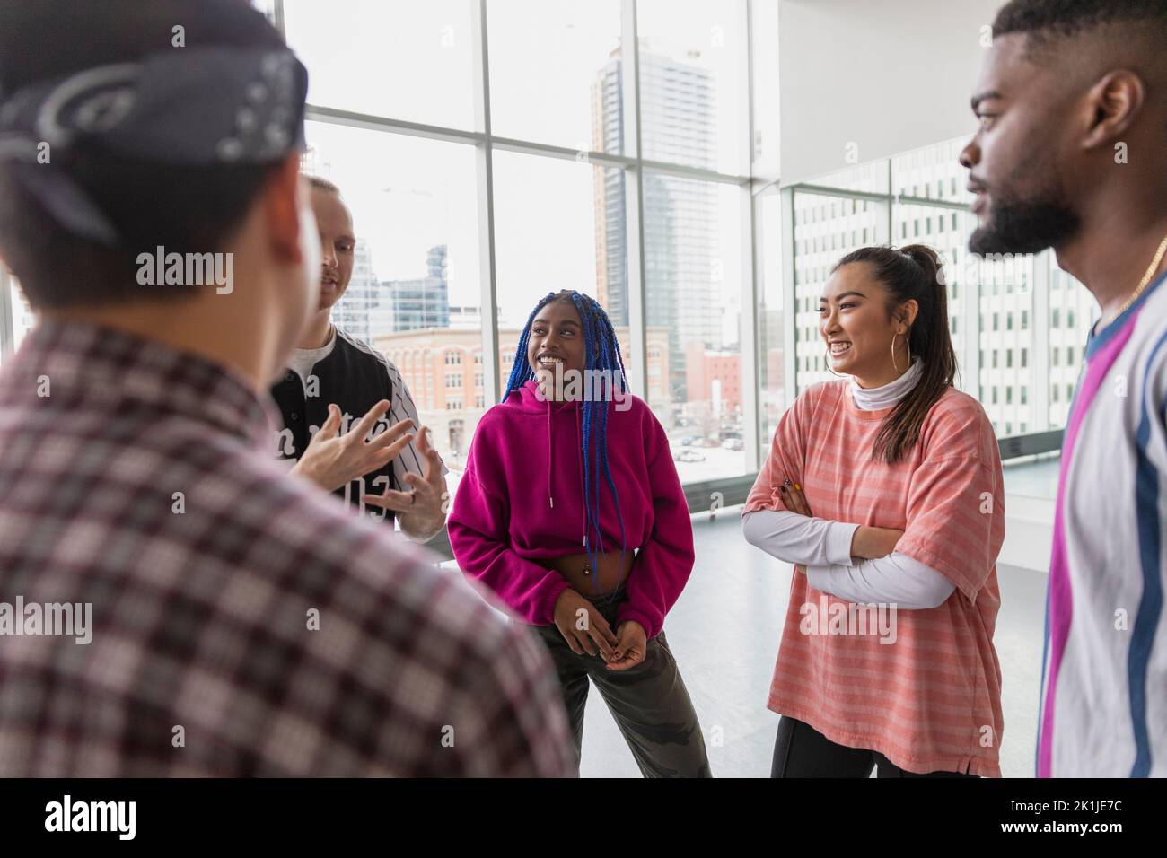 Five women standing in circle hi-res stock photography and images - Alamy