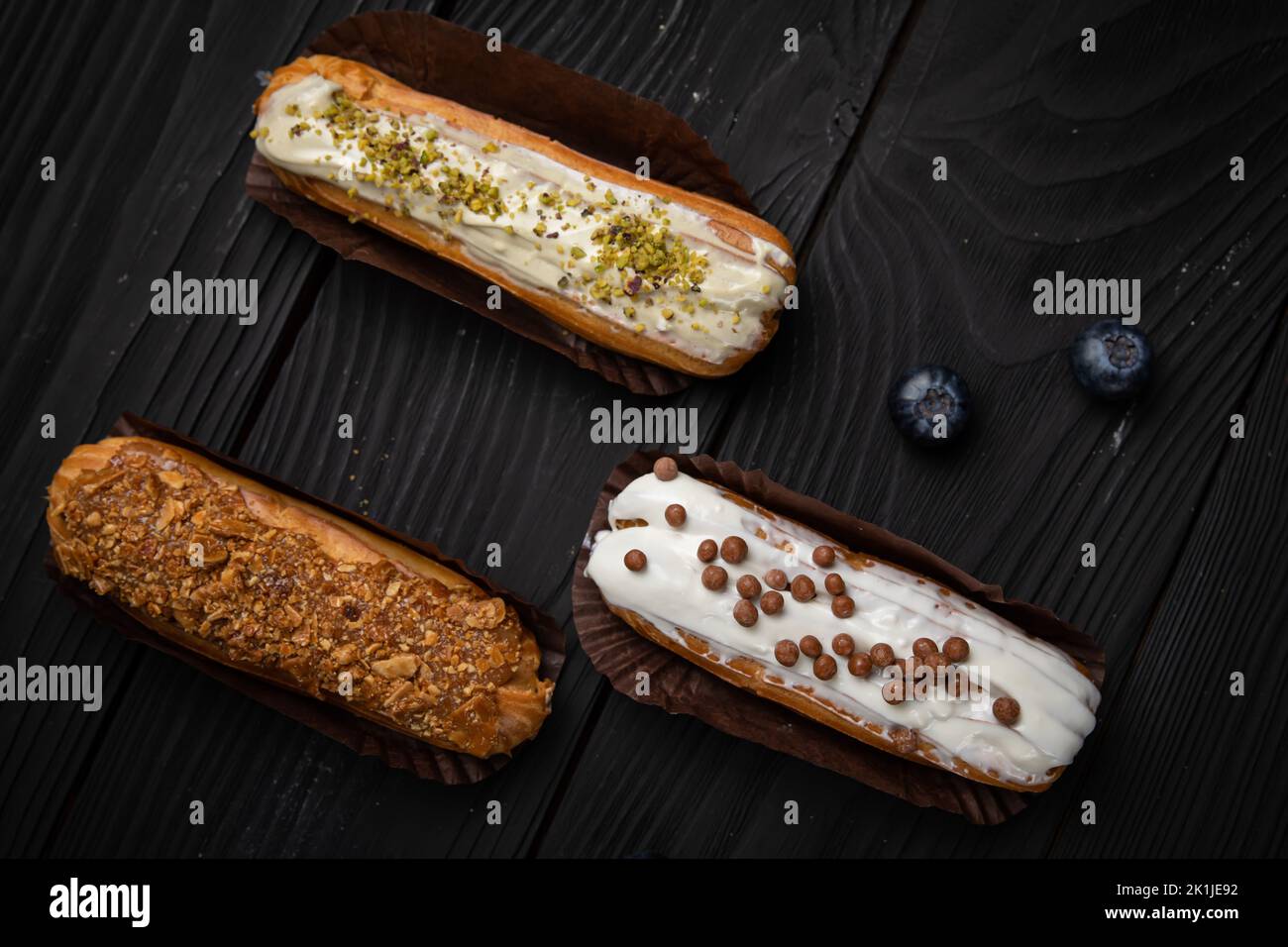 A top view of eclair with various toppings served on a table Stock ...