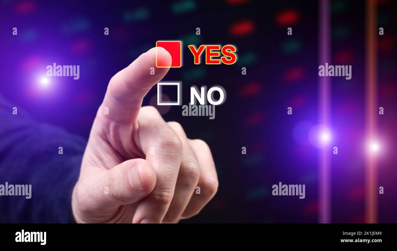 Man selects answer YES on digital display with finger as a choice ...