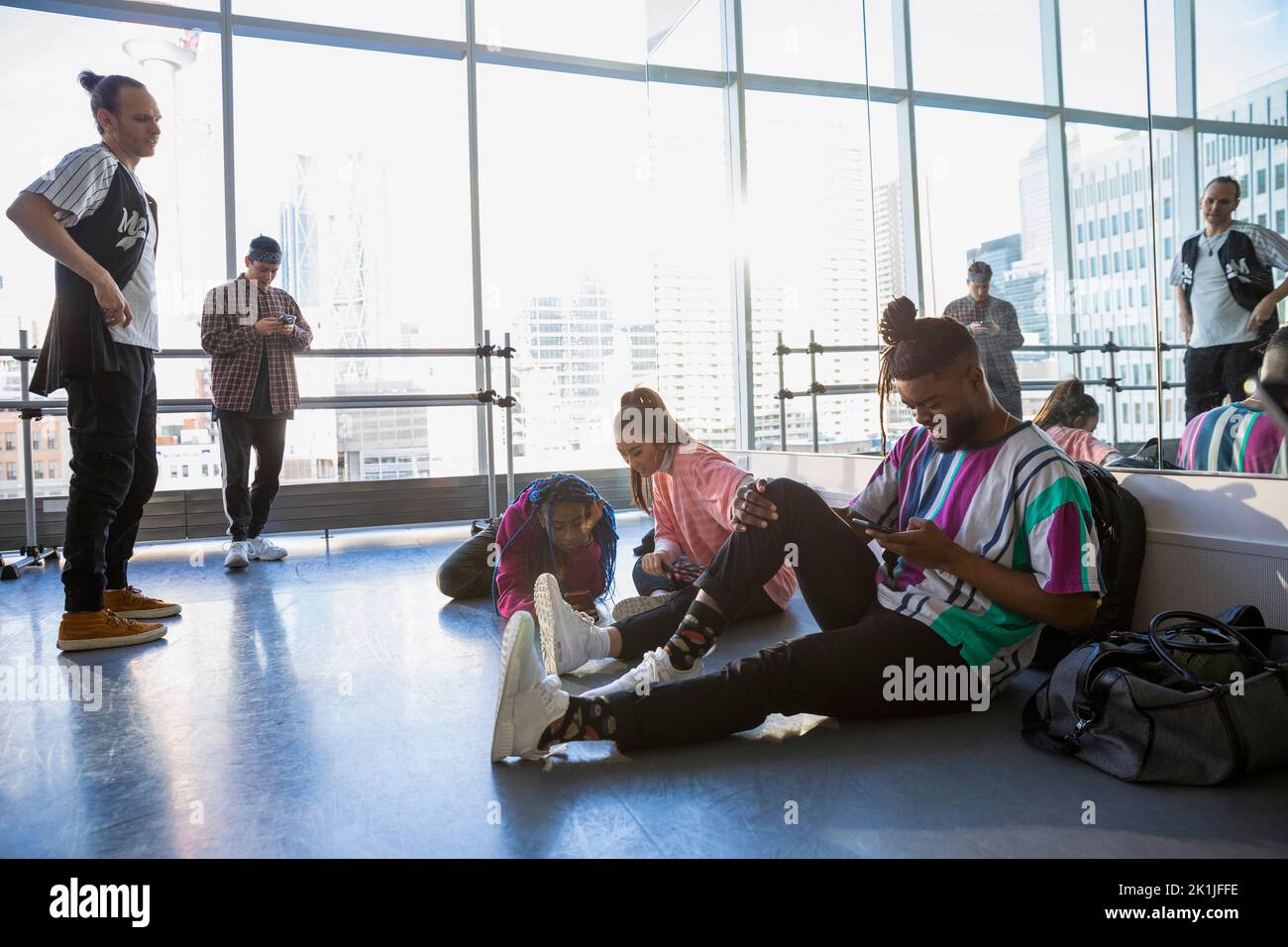 Asian men using mobile phones hi-res stock photography and images - Alamy