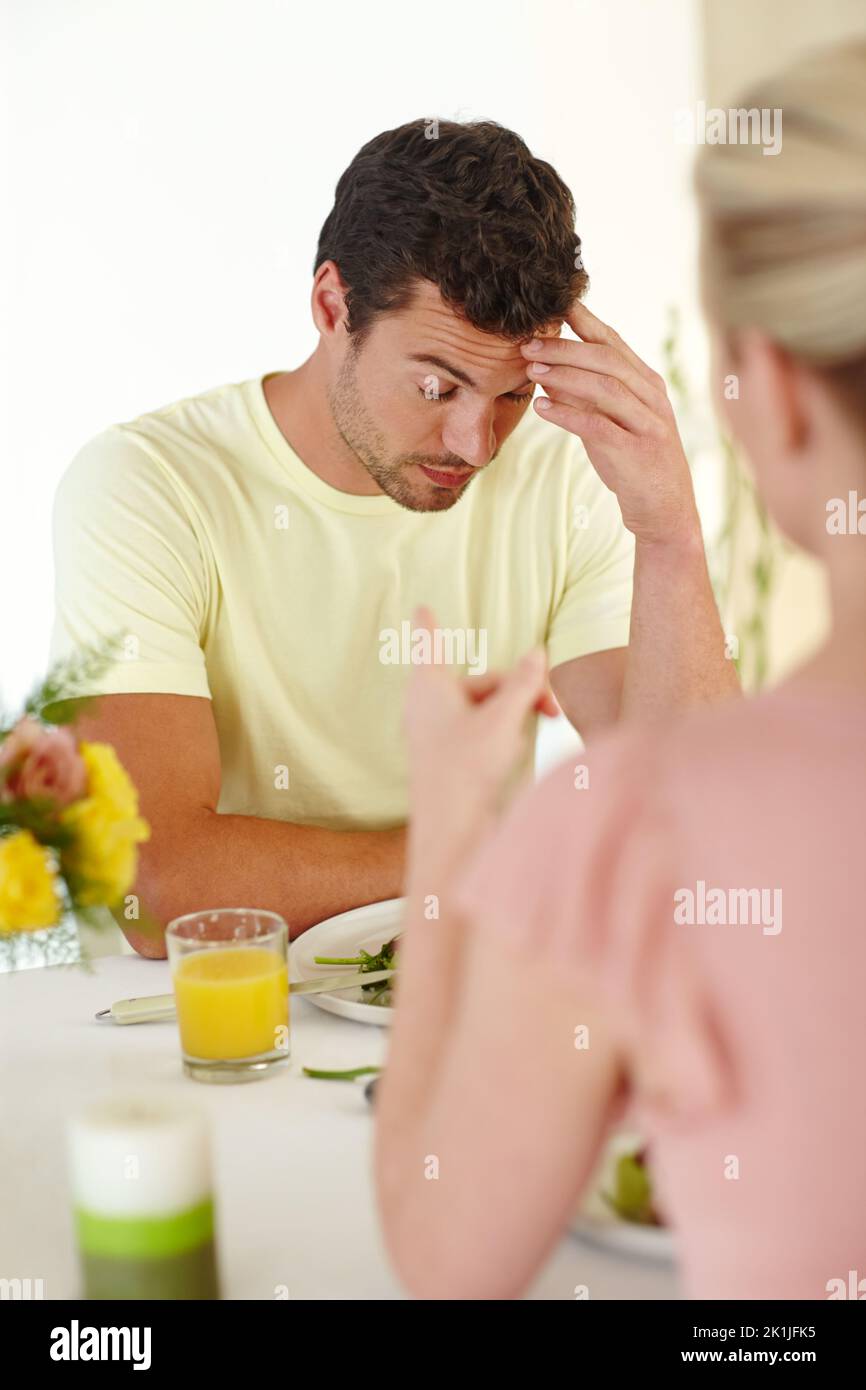 Arguments leave a bad taste in the mouth...A frustrated man sitting ...