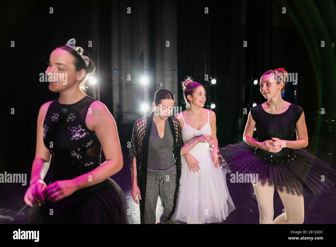 Female coach and ballerinas on stage Stock Photo - Alamy