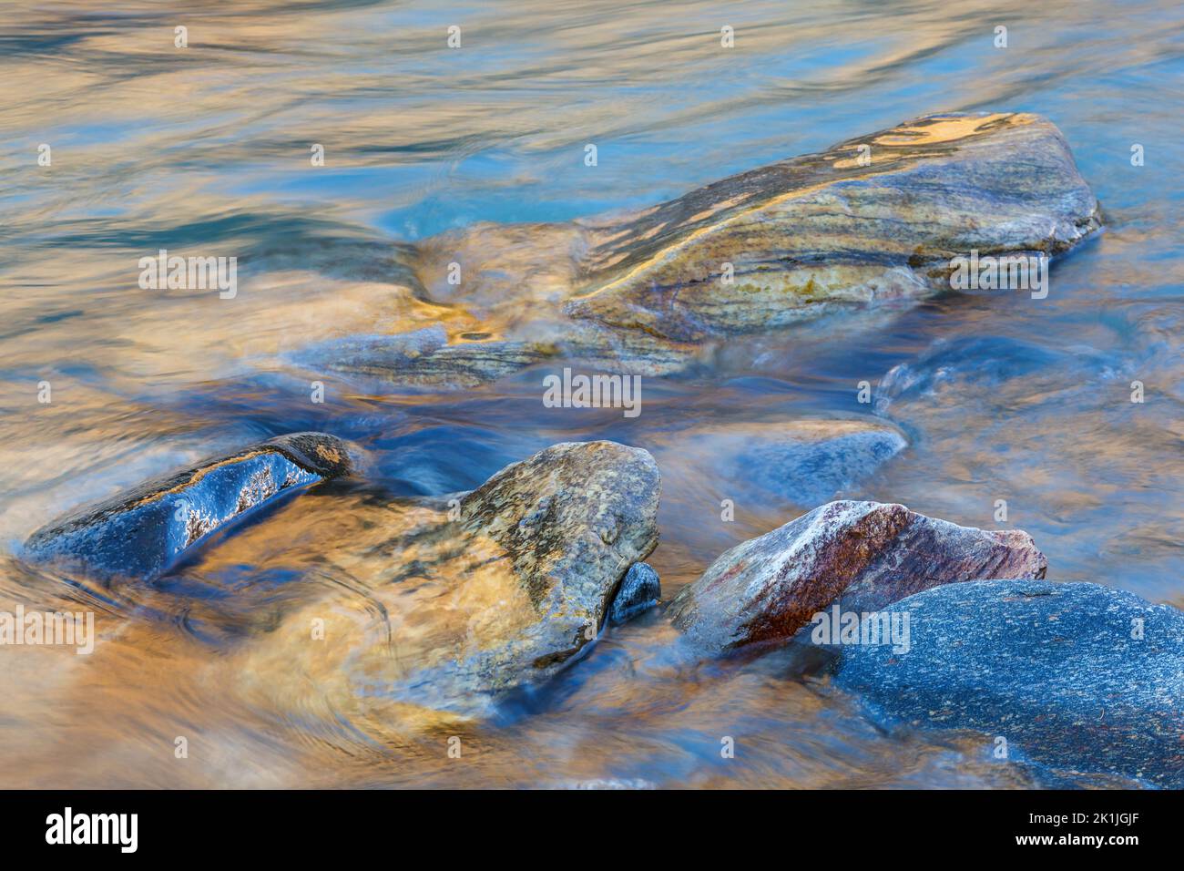 Running water with rocks in a stream Stock Photo - Alamy
