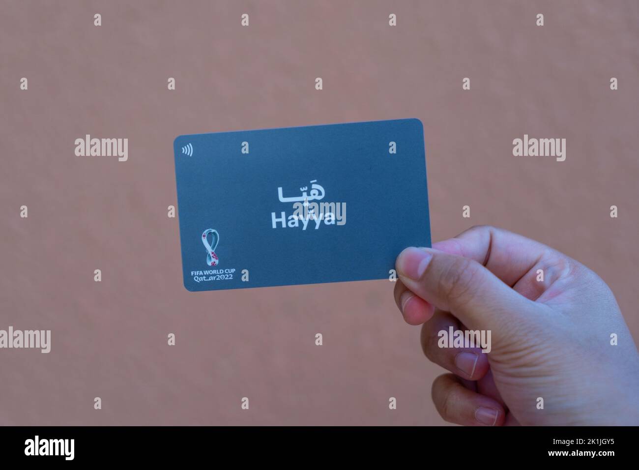 Doha, Qatar - September 18, 2022: Girl hand holding Hayya Card which is ...