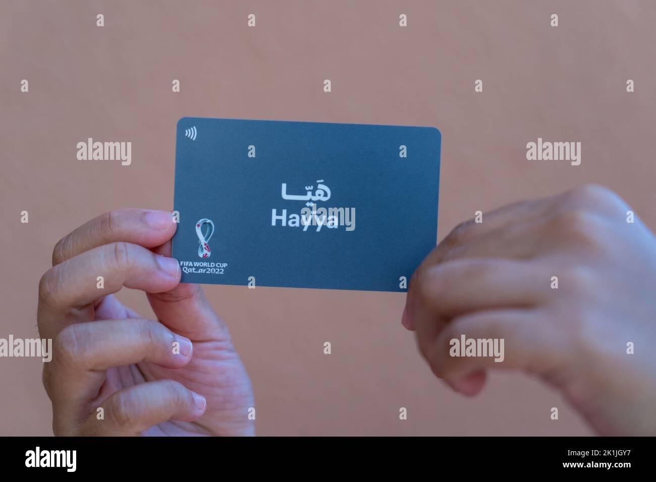 Doha, Qatar - September 18, 2022: Girl hand holding Hayya Card which is ...