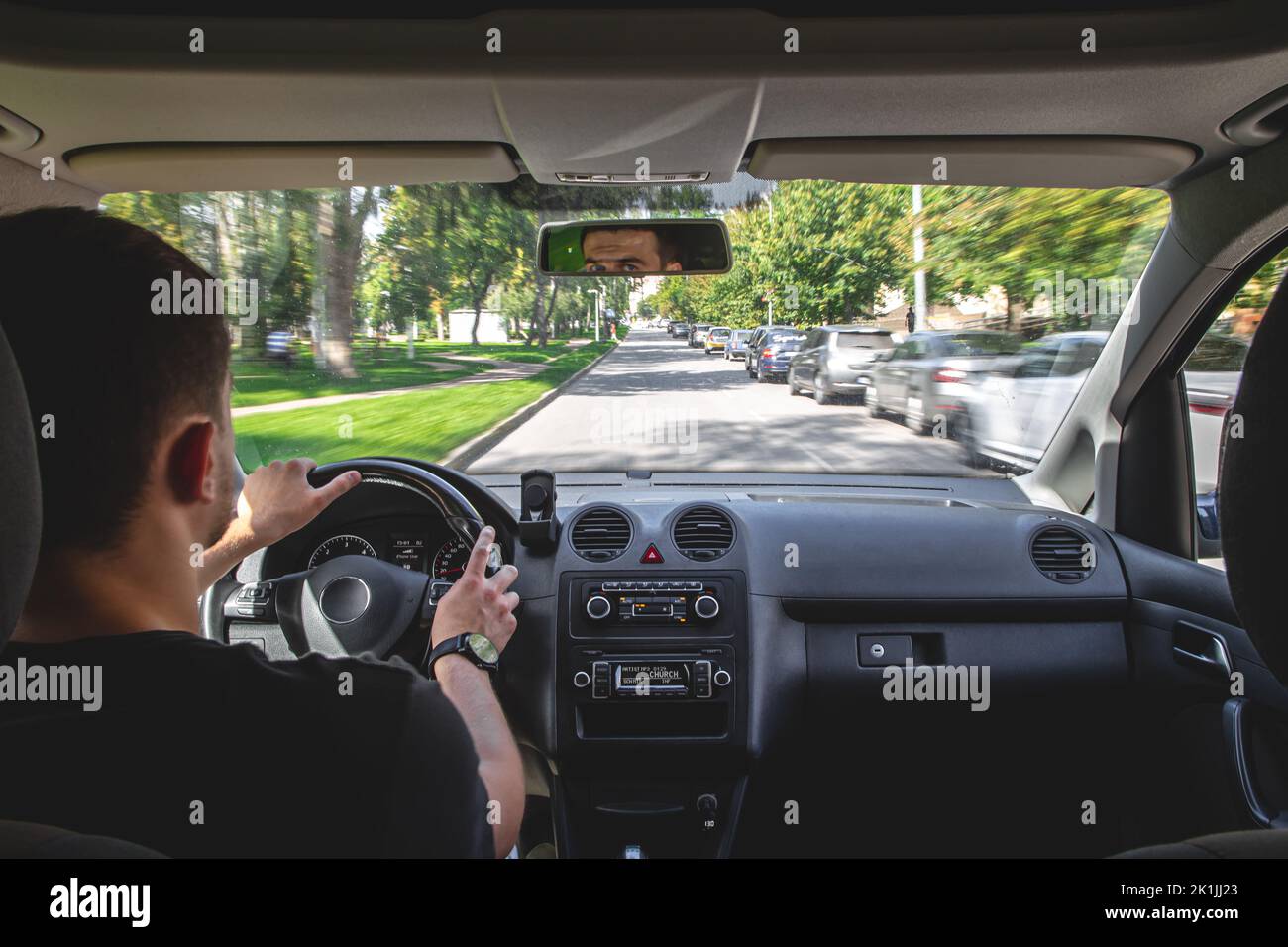 Hands on the wheel when driving at high speed from inside the car Stock ...